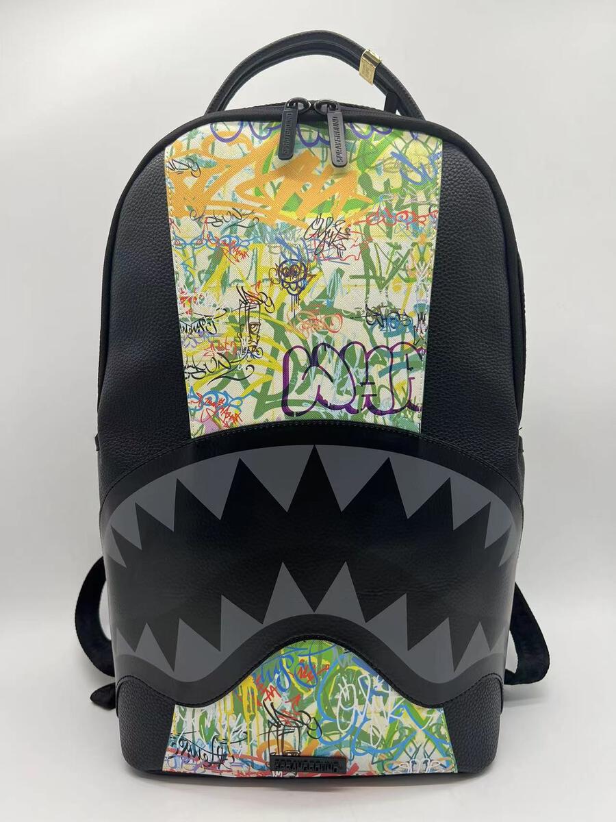 Sprayground - Vivid Raceway Graffiti DLXSV Backpack – OCTANE